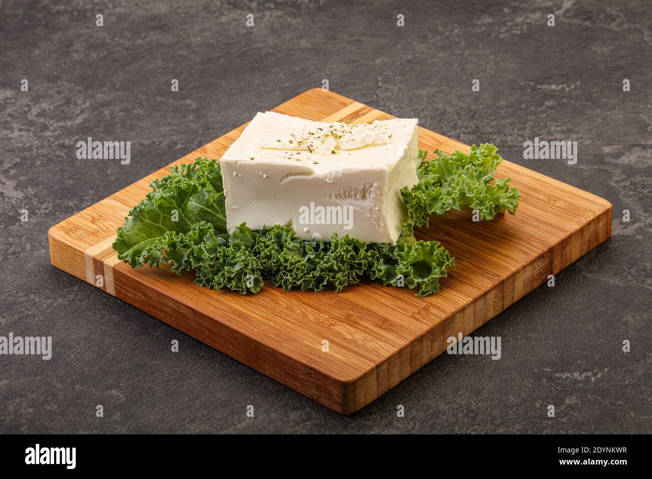 Traditional tasty Greek Feta soft cheese brick Stock Photo - Alamy