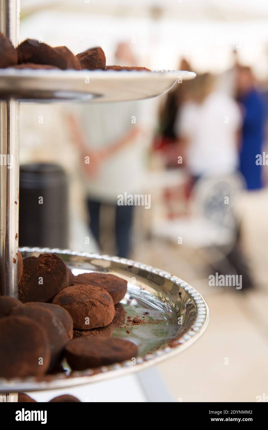 Chocolate truffles with cocoa powder on a buffet table Stock Photo - Alamy