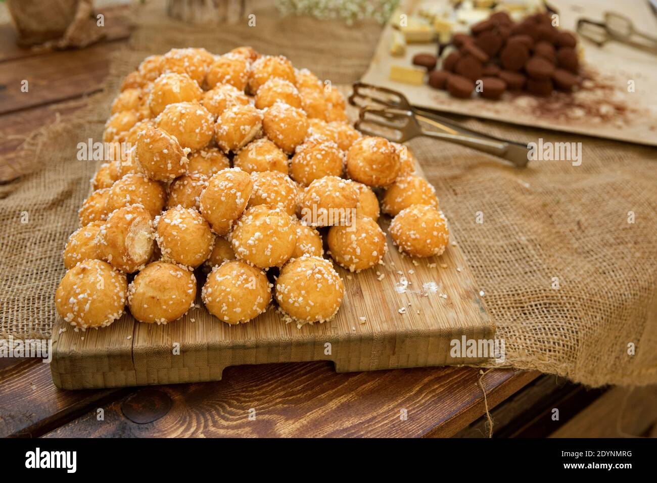 various Finger food desserts on display on a buffet table at a cocktail ...