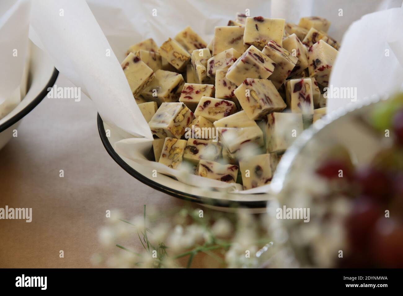 various Finger food desserts on display on a buffet table at a cocktail ...