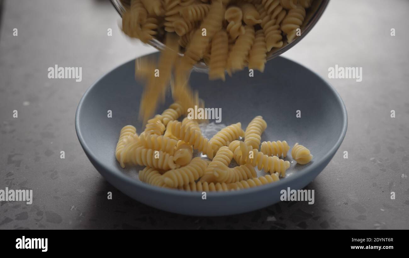 Boiled pasta pouring hi-res stock photography and images - Alamy