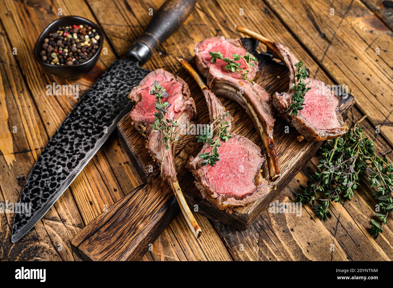 Grilled lamb rib chop steaks. wooden background. Top view Stock Photo ...