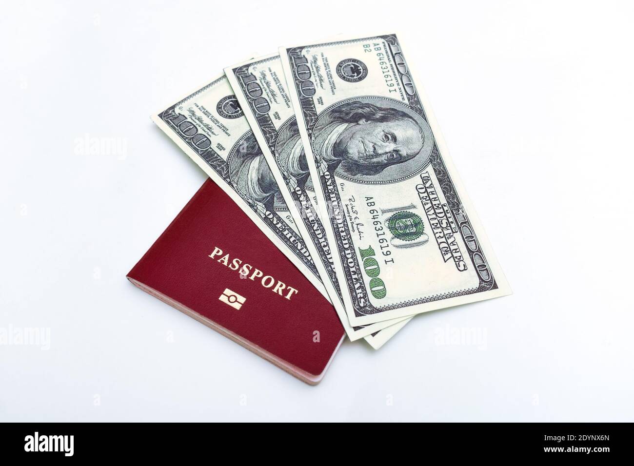 Money and passport on white blank background Stock Photo - Alamy