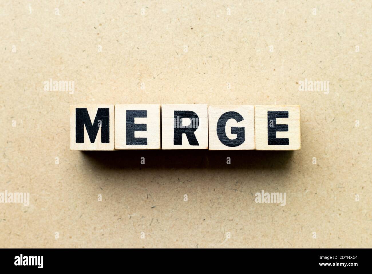 Alphabet letter block in word merge on wood background Stock Photo - Alamy