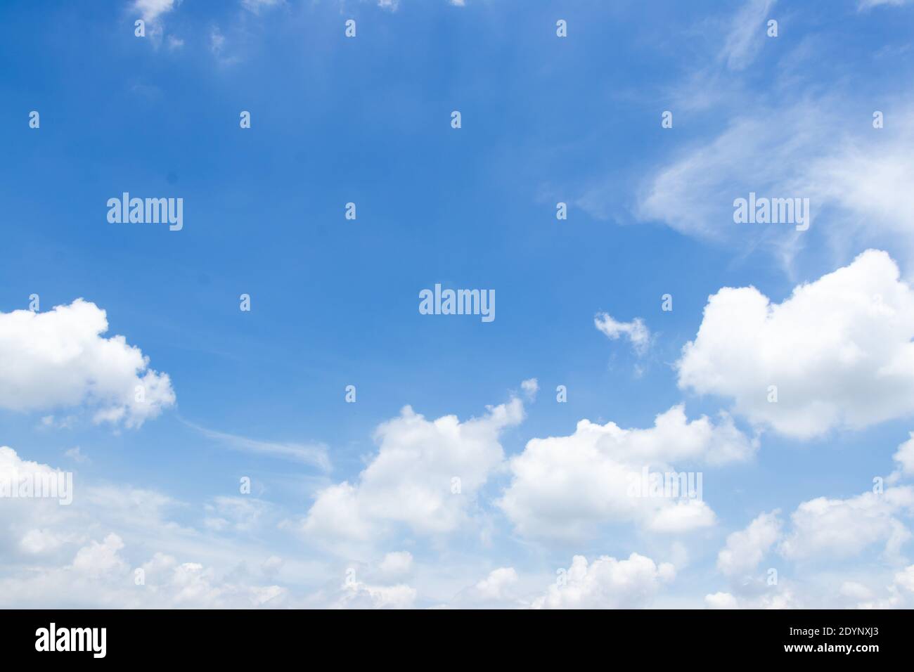Clear blue color sky with white cloud background Stock Photo - Alamy