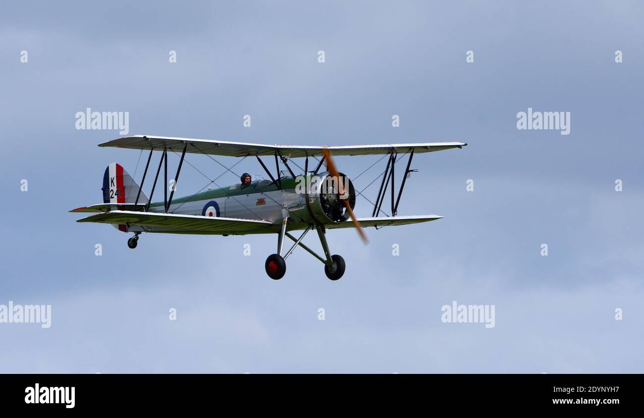 intage Avro 621 Tutor Aircraft in flight dark cloud background Stock ...
