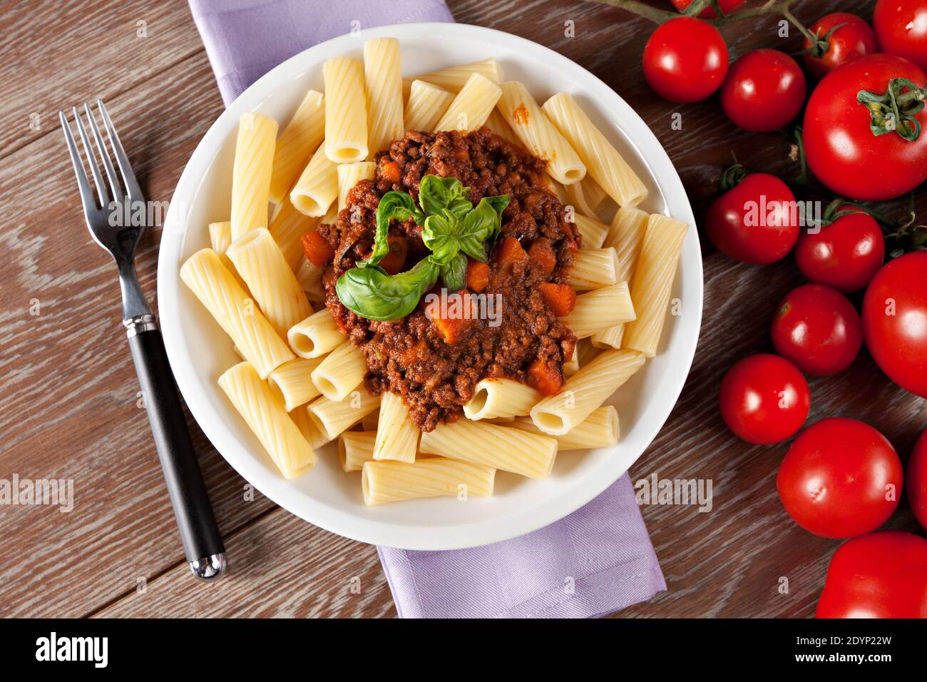 Macaroni Bolognese on a plate. Typical Italian dish Stock Photo - Alamy