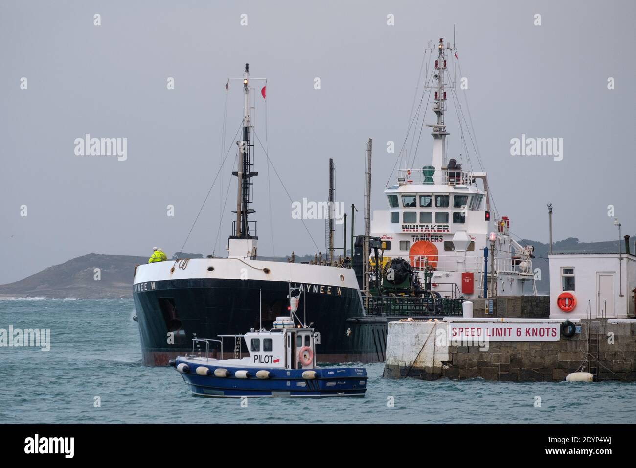 Jaynee W freight ship arriving in St Sampsons harbour, with Pilot boat ...