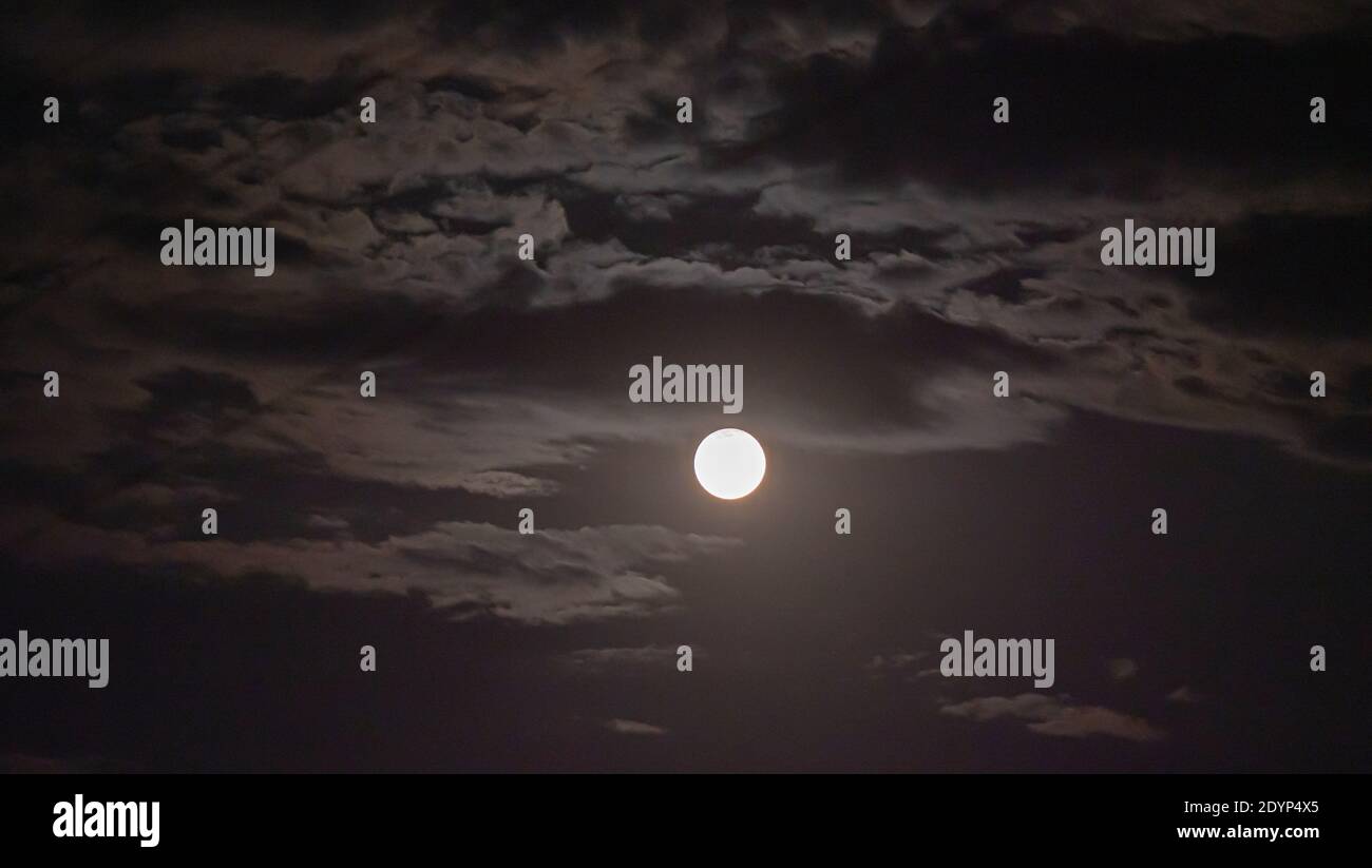 full moon in the sky with clouds landscape Stock Photo - Alamy