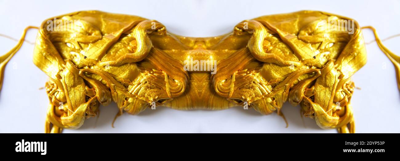 Gold slime on white background Stock Photo - Alamy