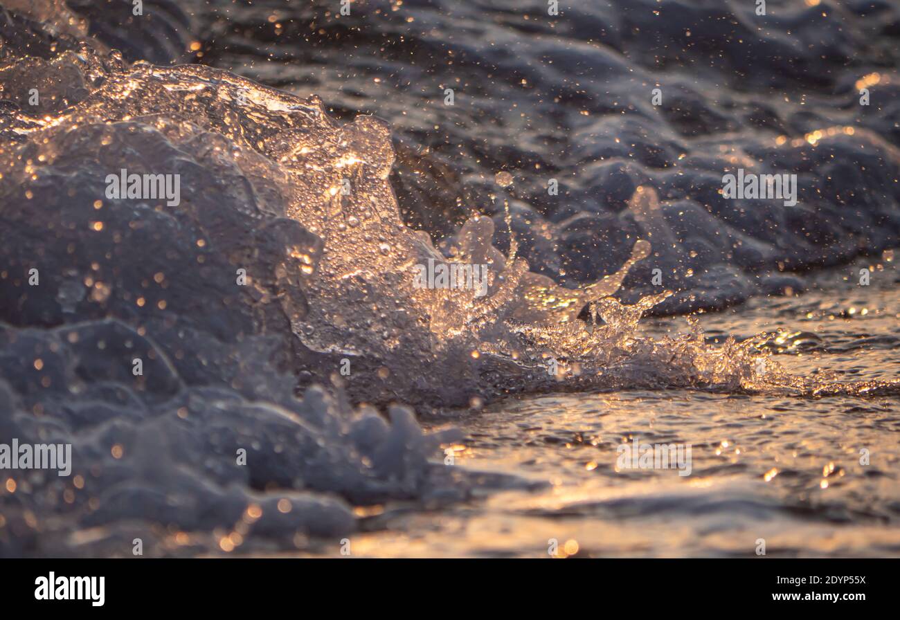 wave splash sea beach macro, close up Stock Photo - Alamy