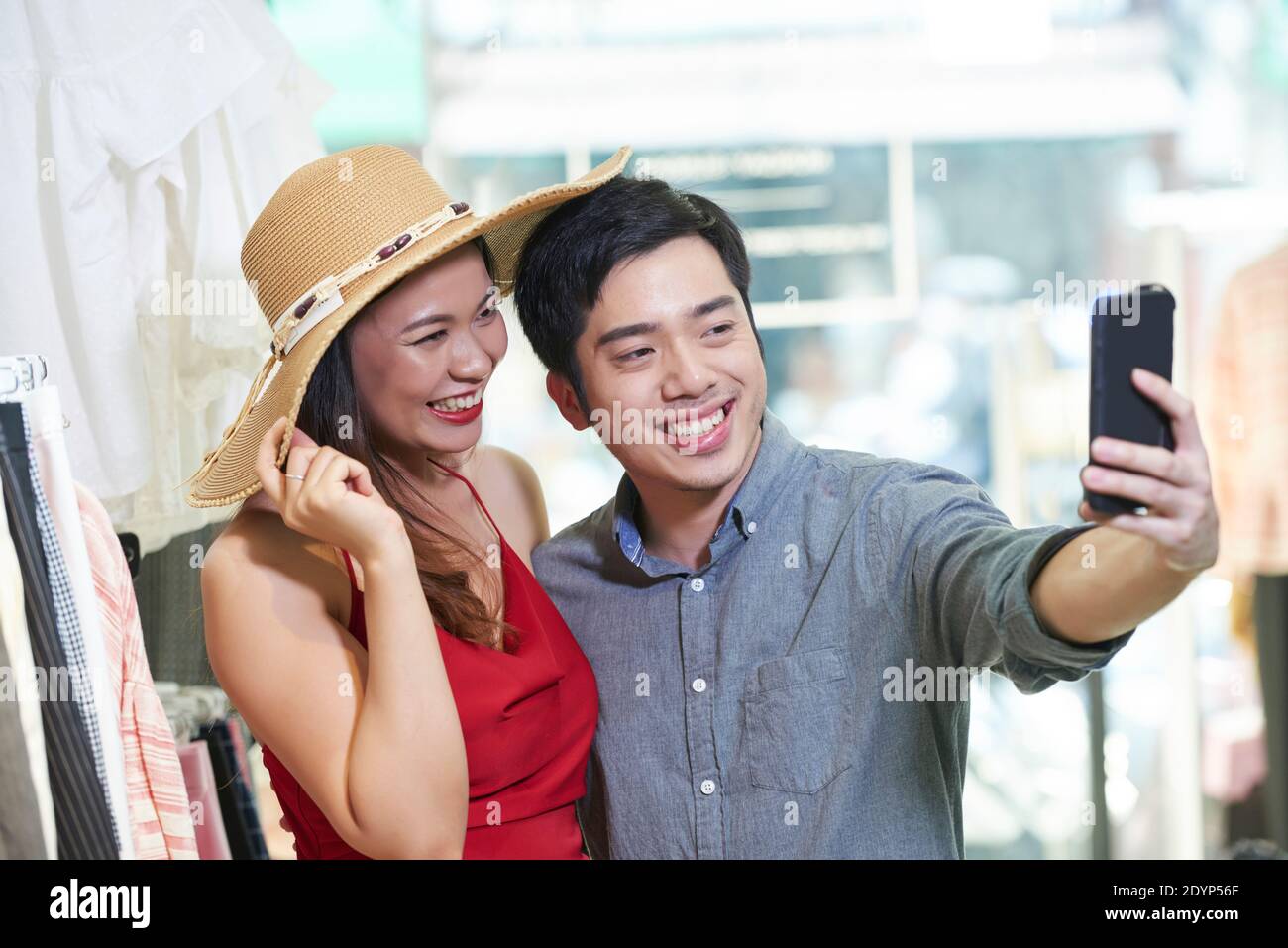 Taking selfie in department store Stock Photo - Alamy