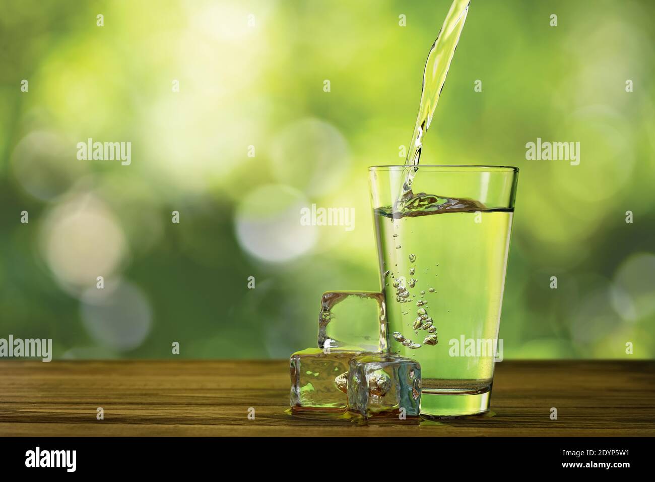 water pouring into glass Stock Photo - Alamy