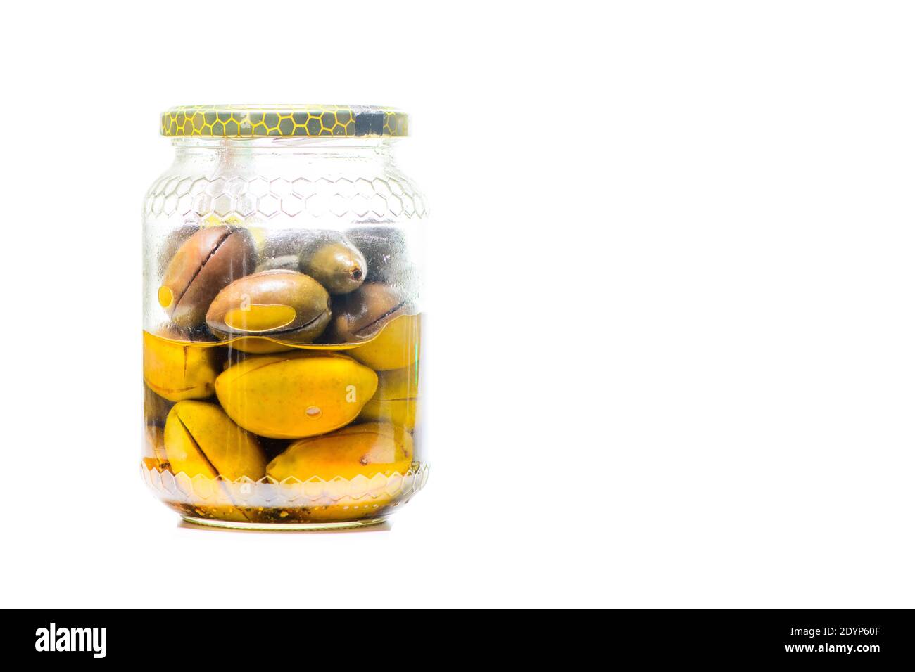 Glass jar with Italian green olives on white background Stock Photo - Alamy