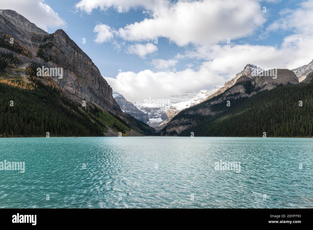 Scenery of Lake Louise with rocky mountains and blue sky at Banff ...
