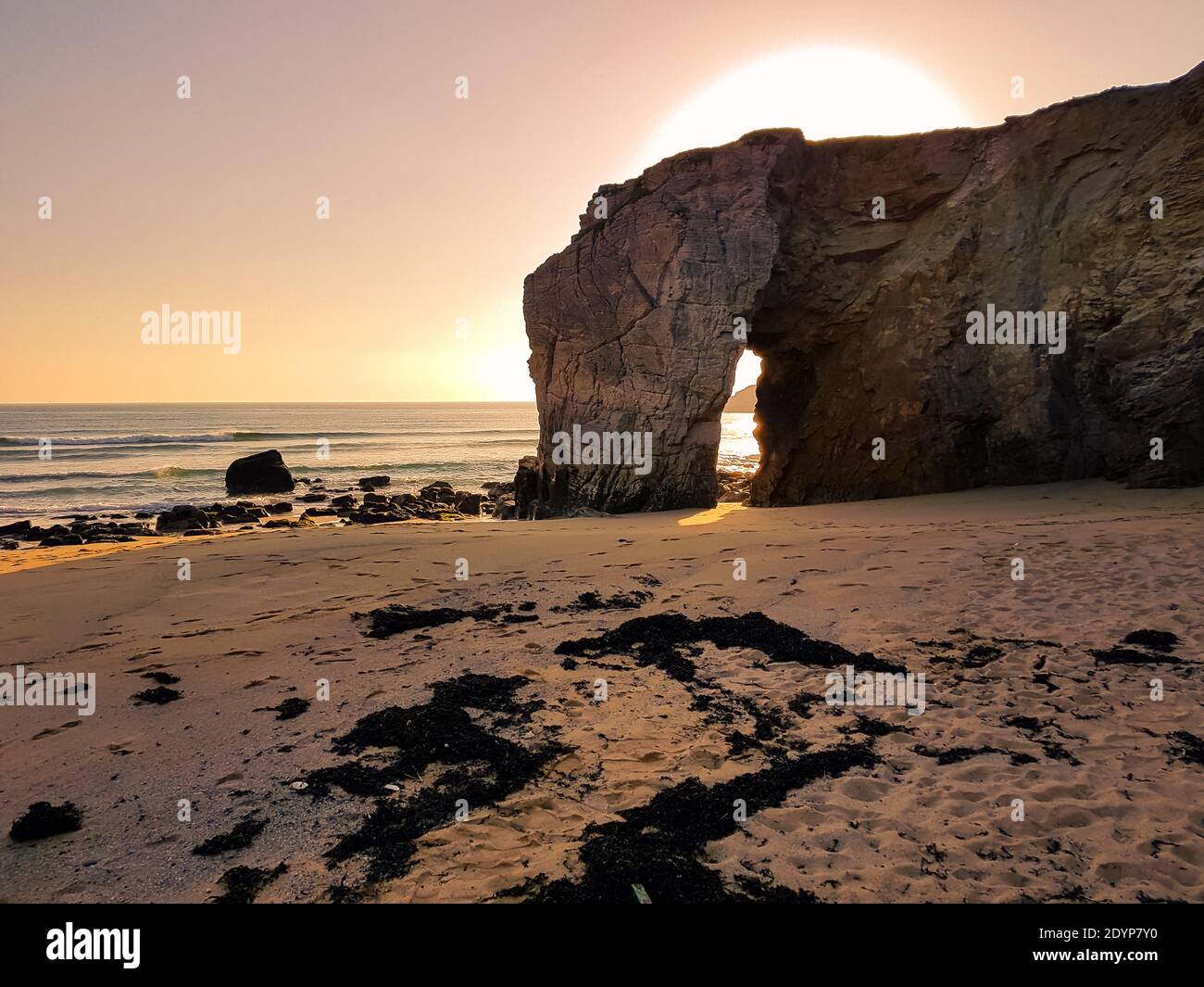 Rock with a hole hi-res stock photography and images - Alamy