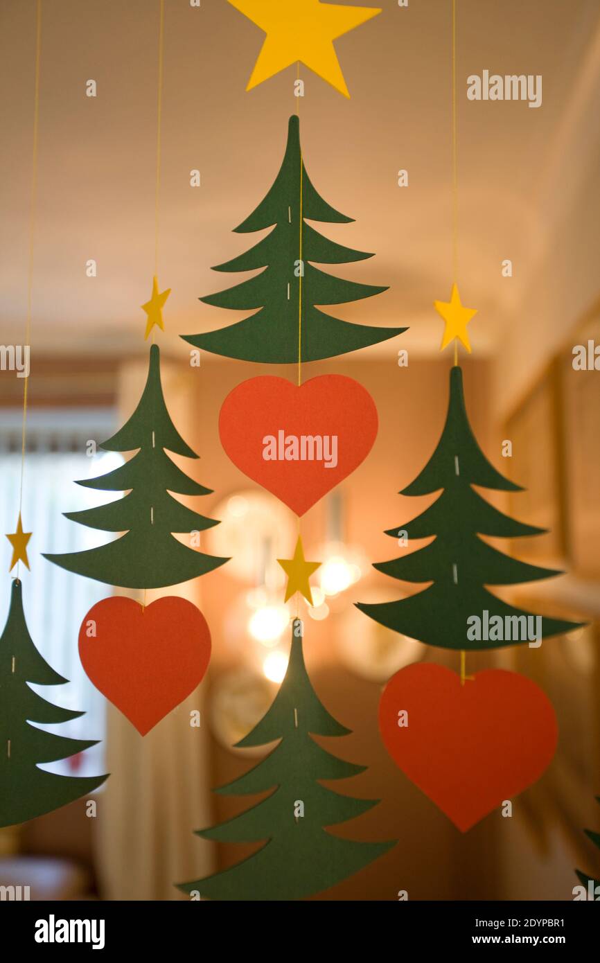 Christmas hanging mobile with trees hearts and stars Stock Photo - Alamy