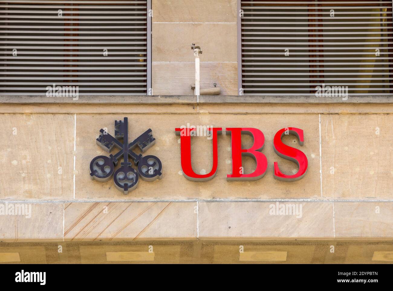 UBS sign on the wall of an UBS office building. UBS is a Swiss global ...