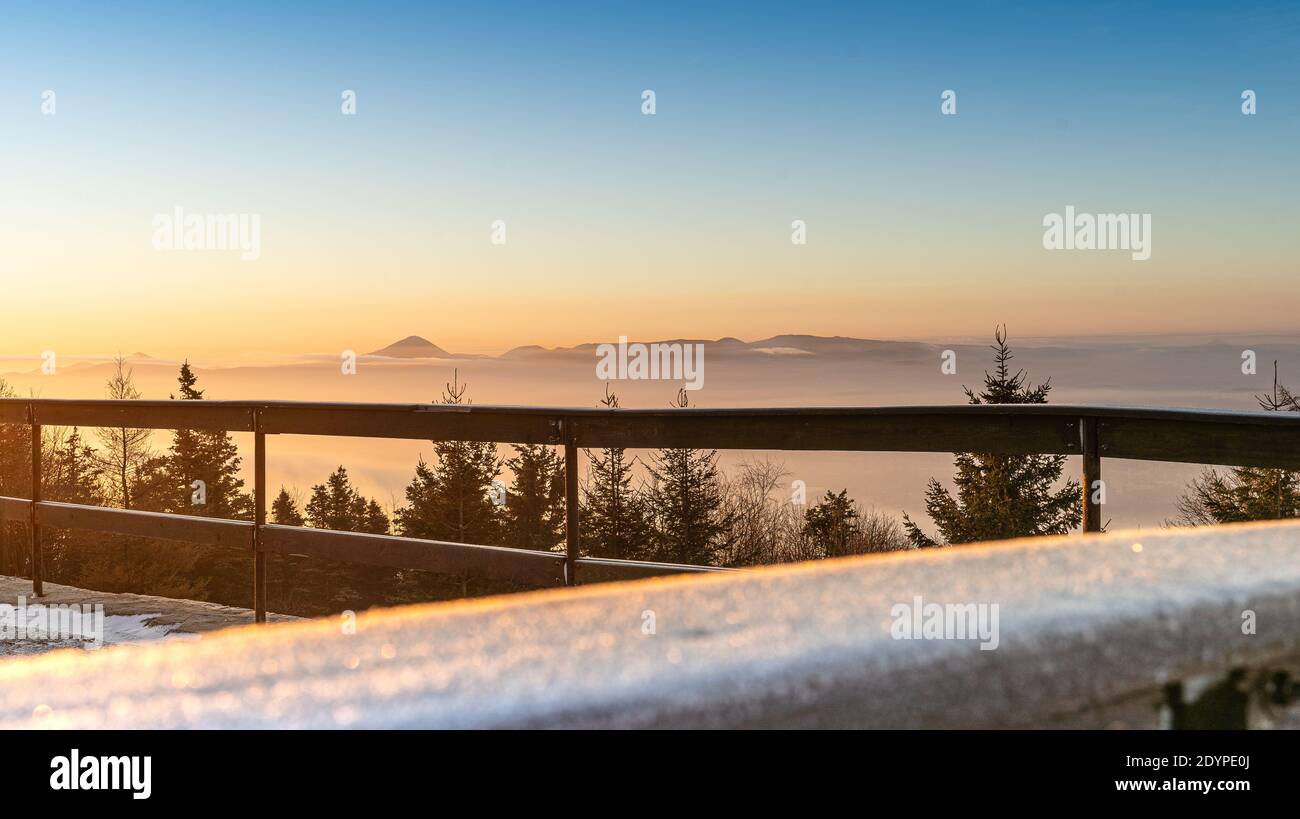 Sun rising above the land on blue sky. Nature background with sunny ...