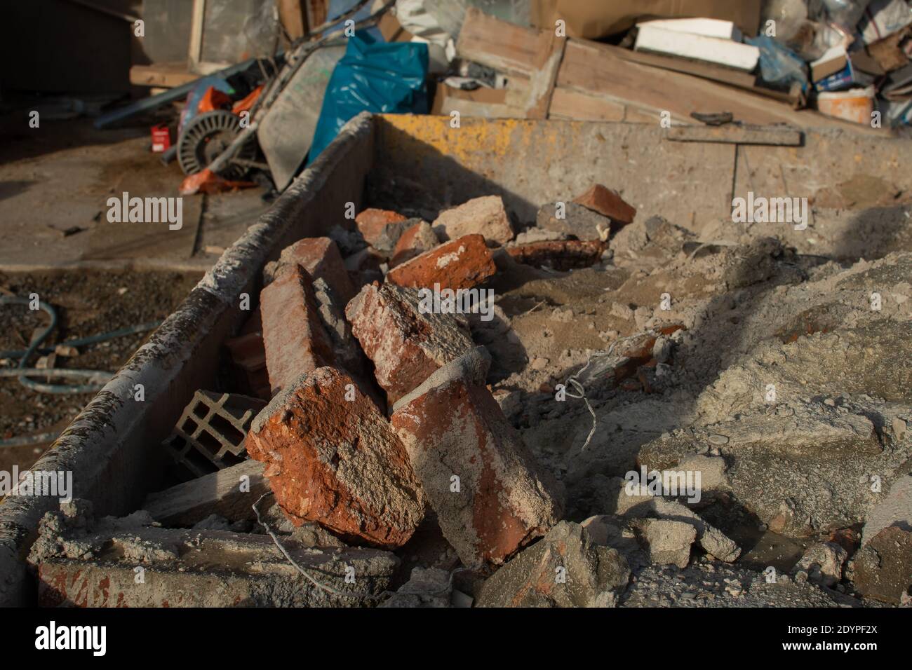 Container with rubbish. Construction site. Building is being ...