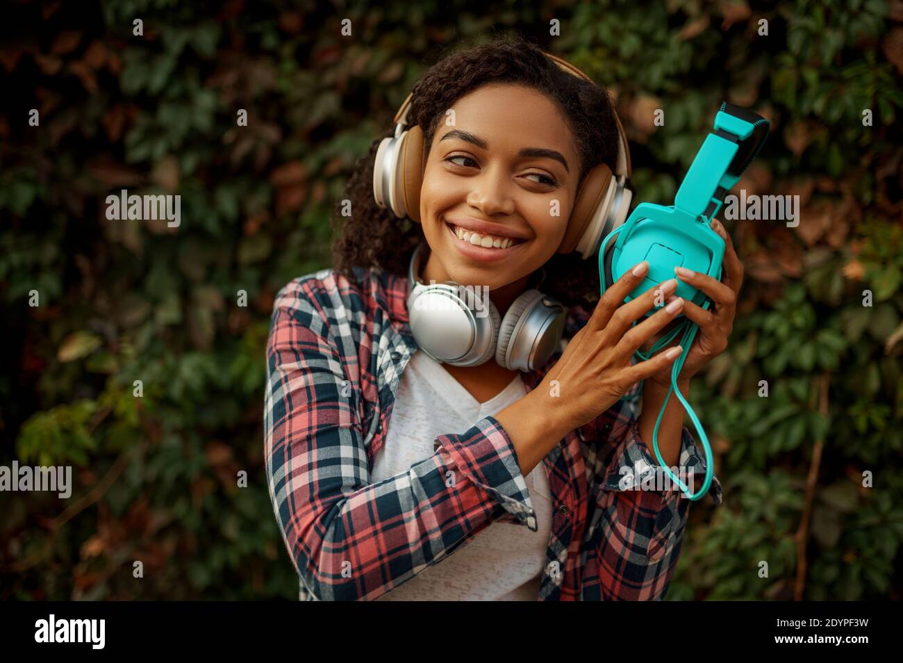 Music lover in headphones listening to music Stock Photo - Alamy