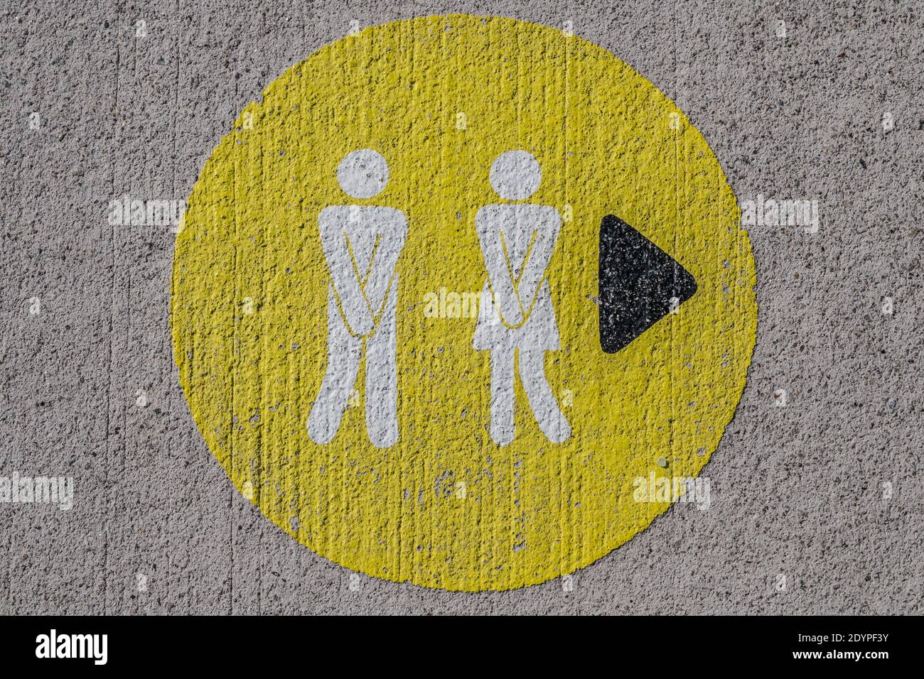 A male and female in distress having to go to the restroom signage on ...
