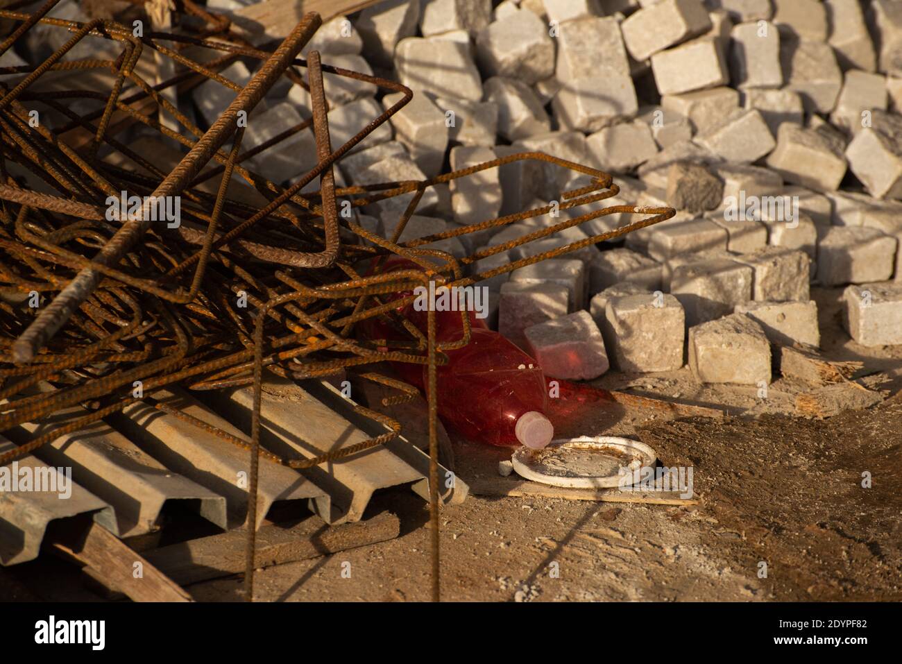 Cobblestone use in building site. Construction site. Building is being ...