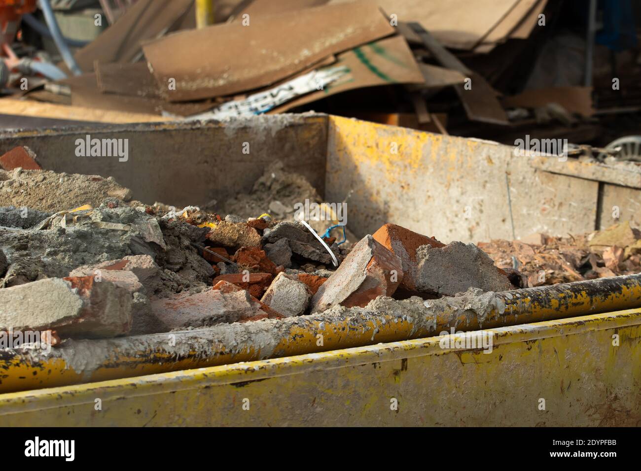 Container with rubbish. Construction site. Building is being ...