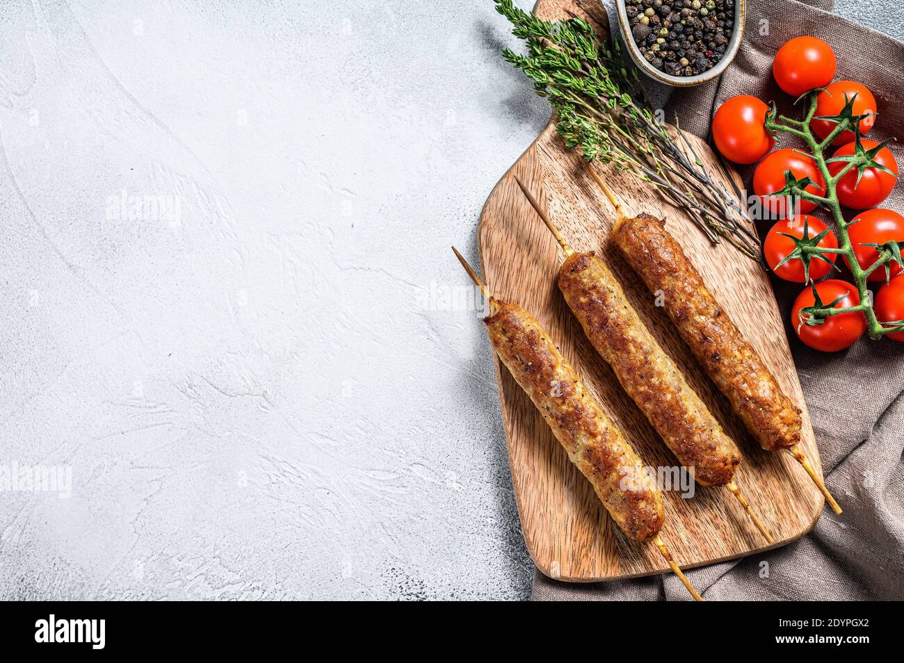 Turkish and Arabic Traditional kebab on cutting board, ground beef ...