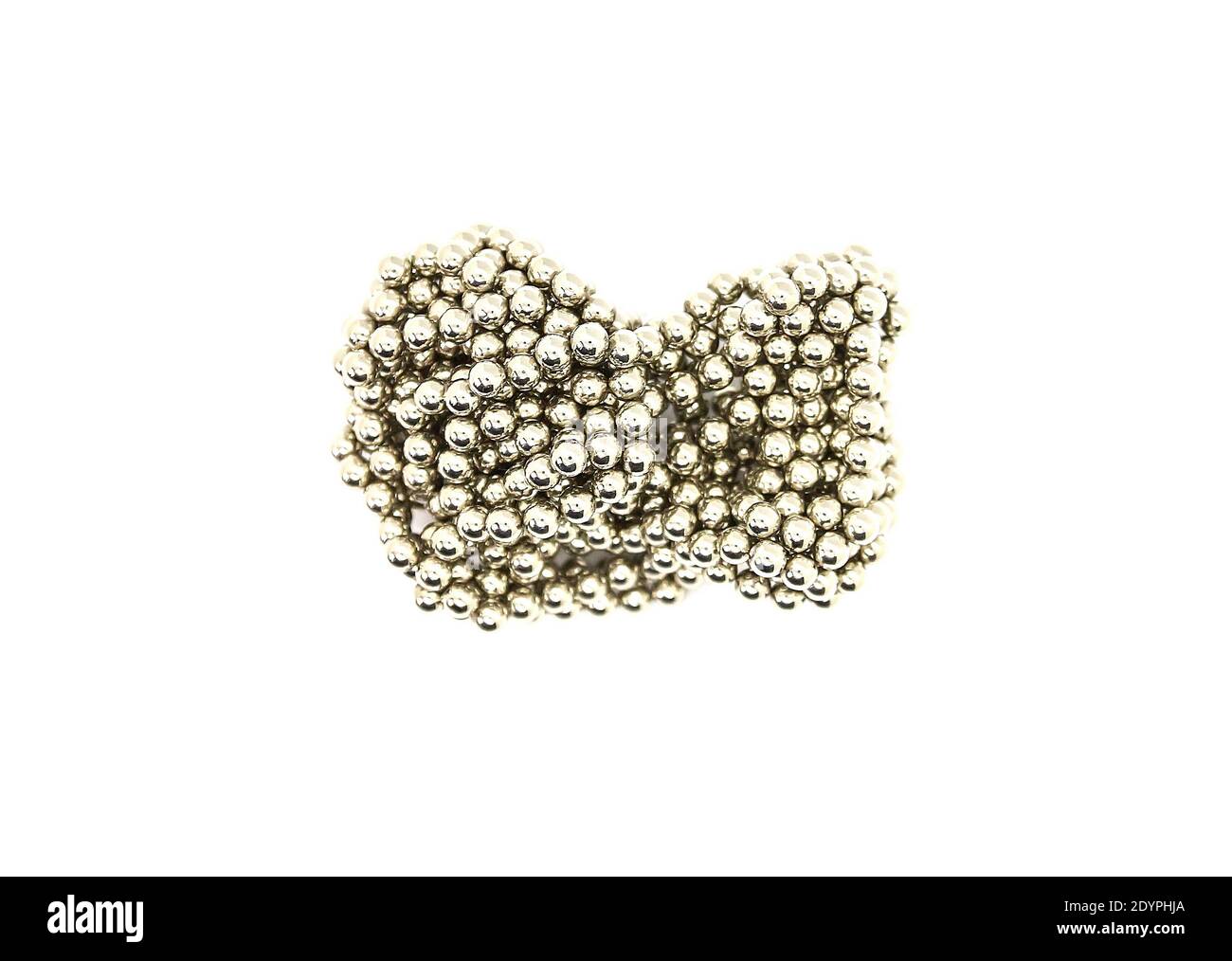 Shape made of metal sphere segments on white background Stock Photo - Alamy