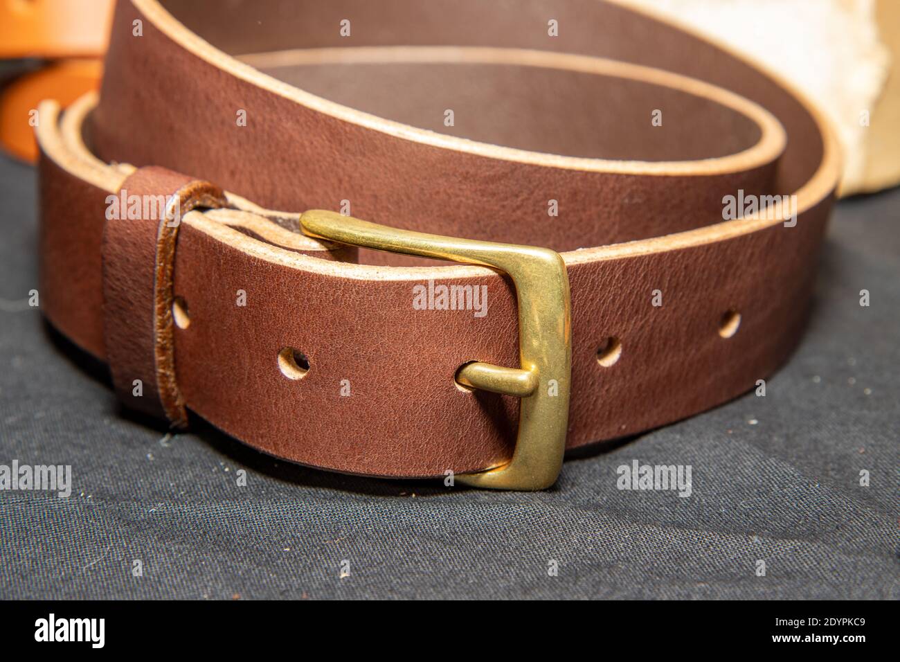 Metal belt buckle made brown hi-res stock photography and images - Alamy