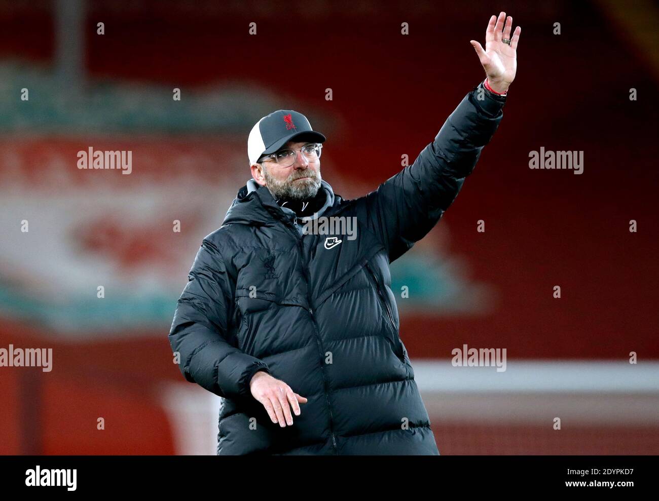 Liverpool manager Jurgen Klopp waves to the fans at the end of the ...