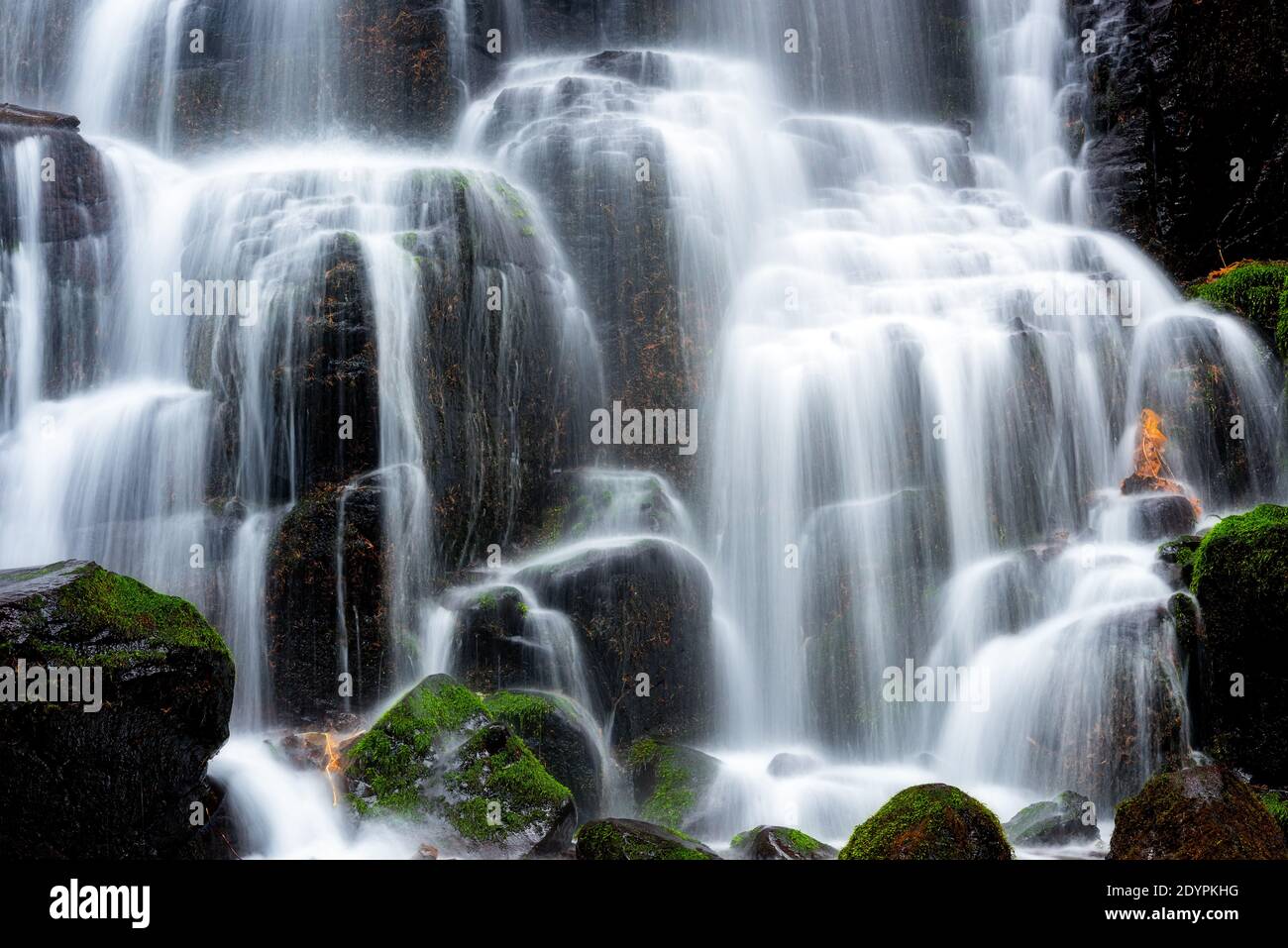 Beautiful little waterfall that has a mystical look to it Stock Photo ...