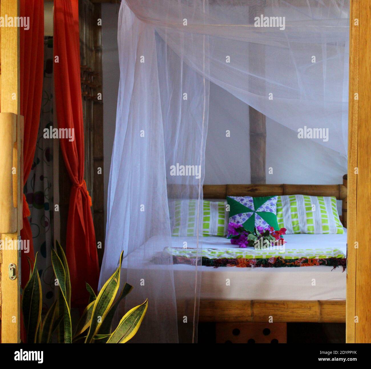 A beautiful bed ready for a very warm night Stock Photo - Alamy