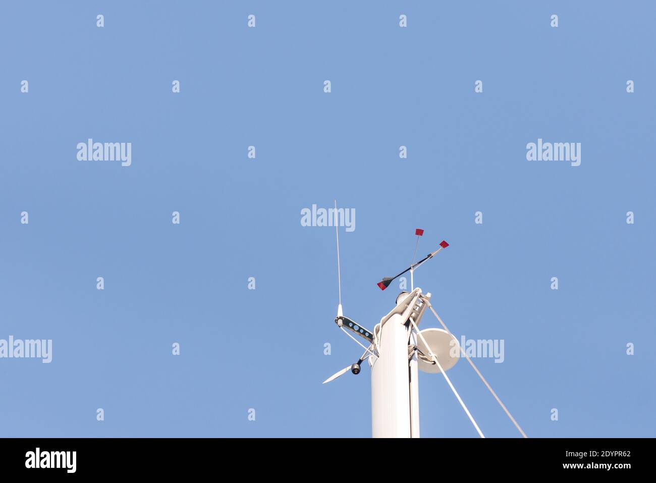 Top of the yacht's mast. Equipment on the top of the mast. Wind meter ...