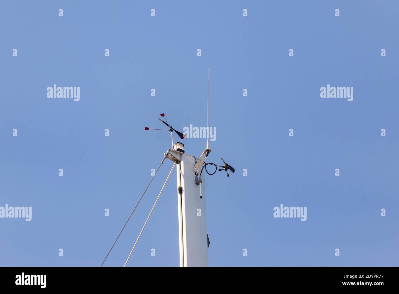 Top of the yacht's mast. Equipment on the top of the mast. Wind meter ...