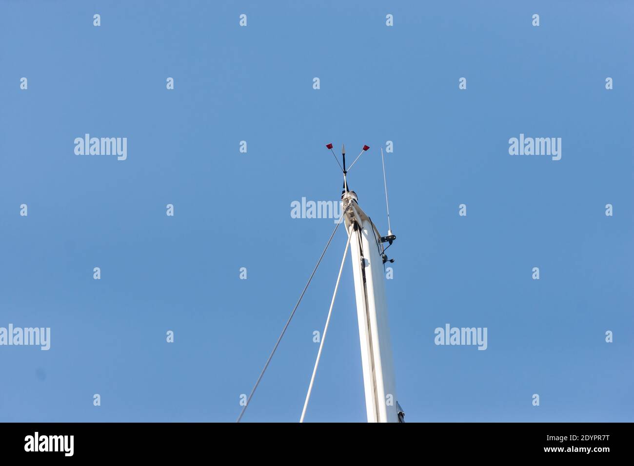 Top of the yacht's mast. Equipment on the top of the mast. Wind meter ...