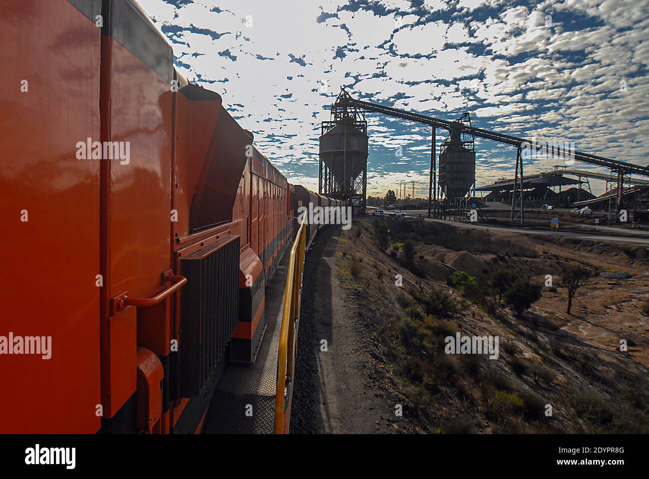 A diesel train carrying raw coal ore at an Australian open face mine ...