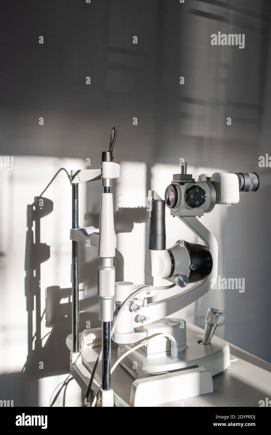 Ophthalmological diagnostic equipment on doctor workplace inside ...