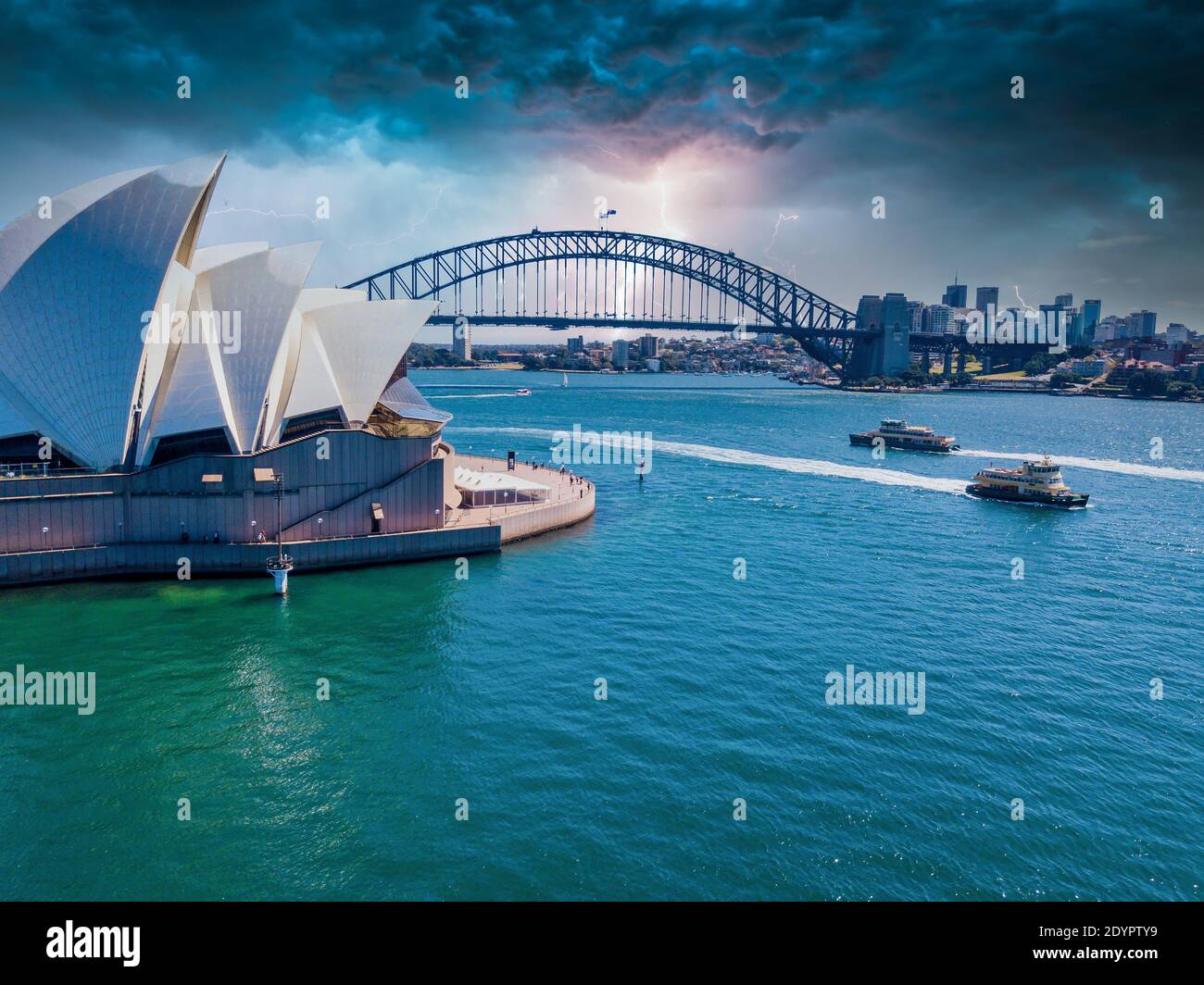 An amazing aerial view of Sydney city, the harbor bridge and the modern ...