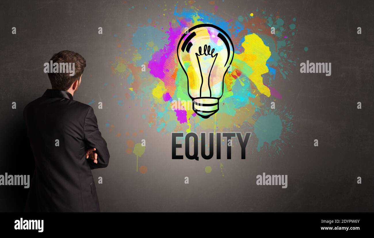 businessman drawing colorful light bulb with EQUITY inscription on ...