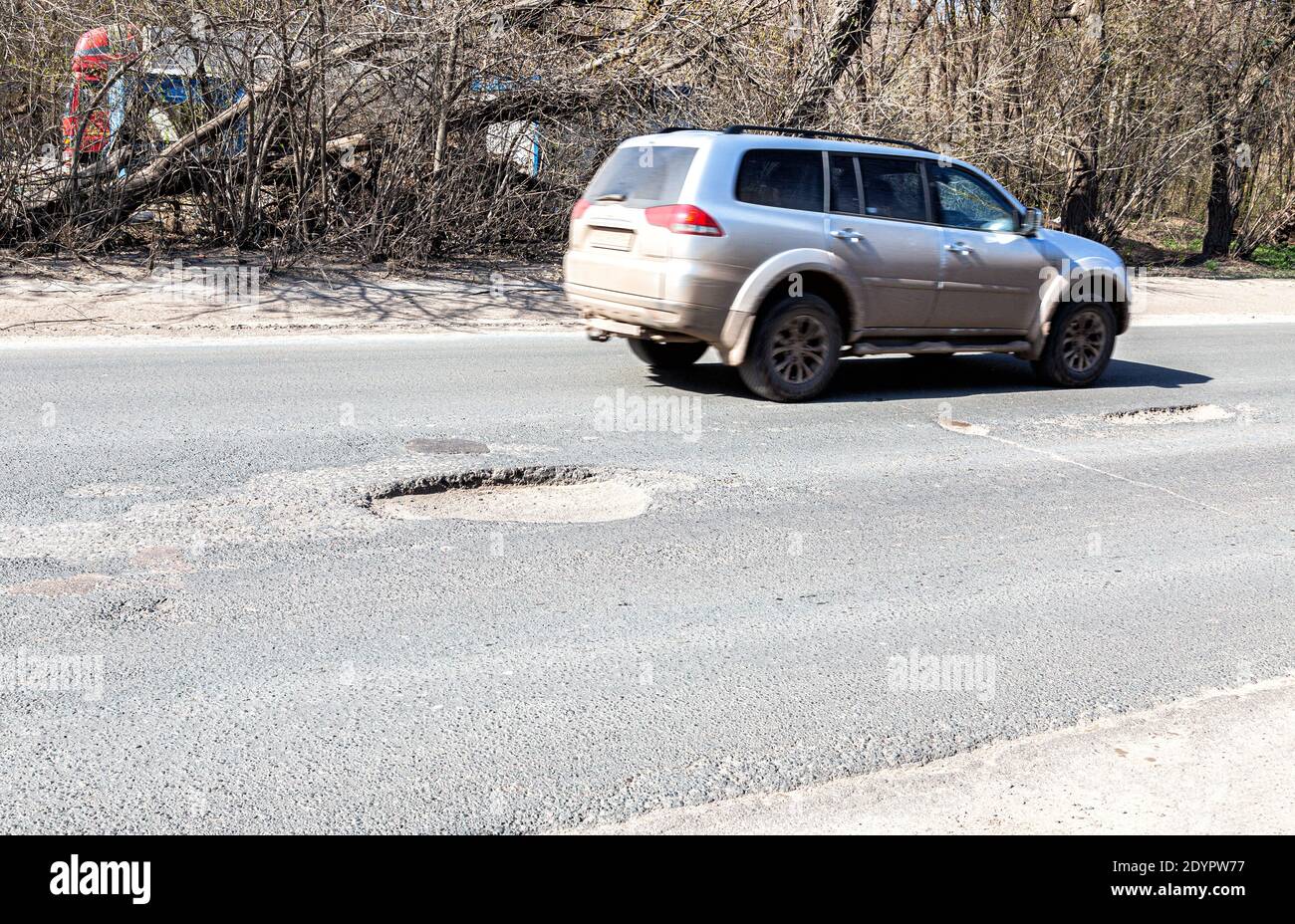 Large deep pothole an example of poor road maintenance Stock Photo - Alamy