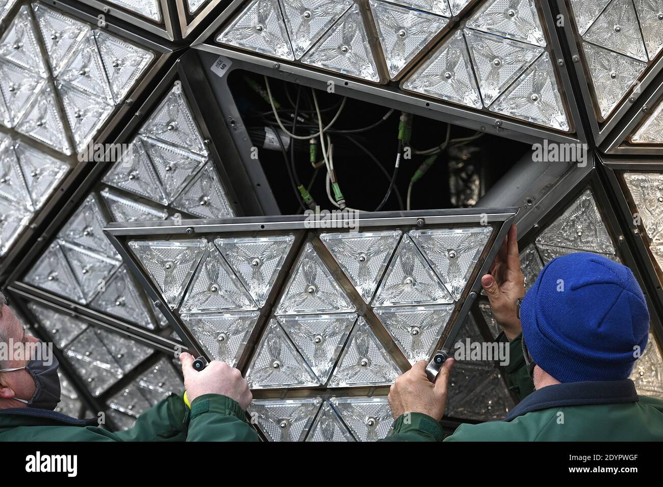 New York, USA. 27th Dec, 2020. (L-R) Landmark electricians Chris Sisti ...