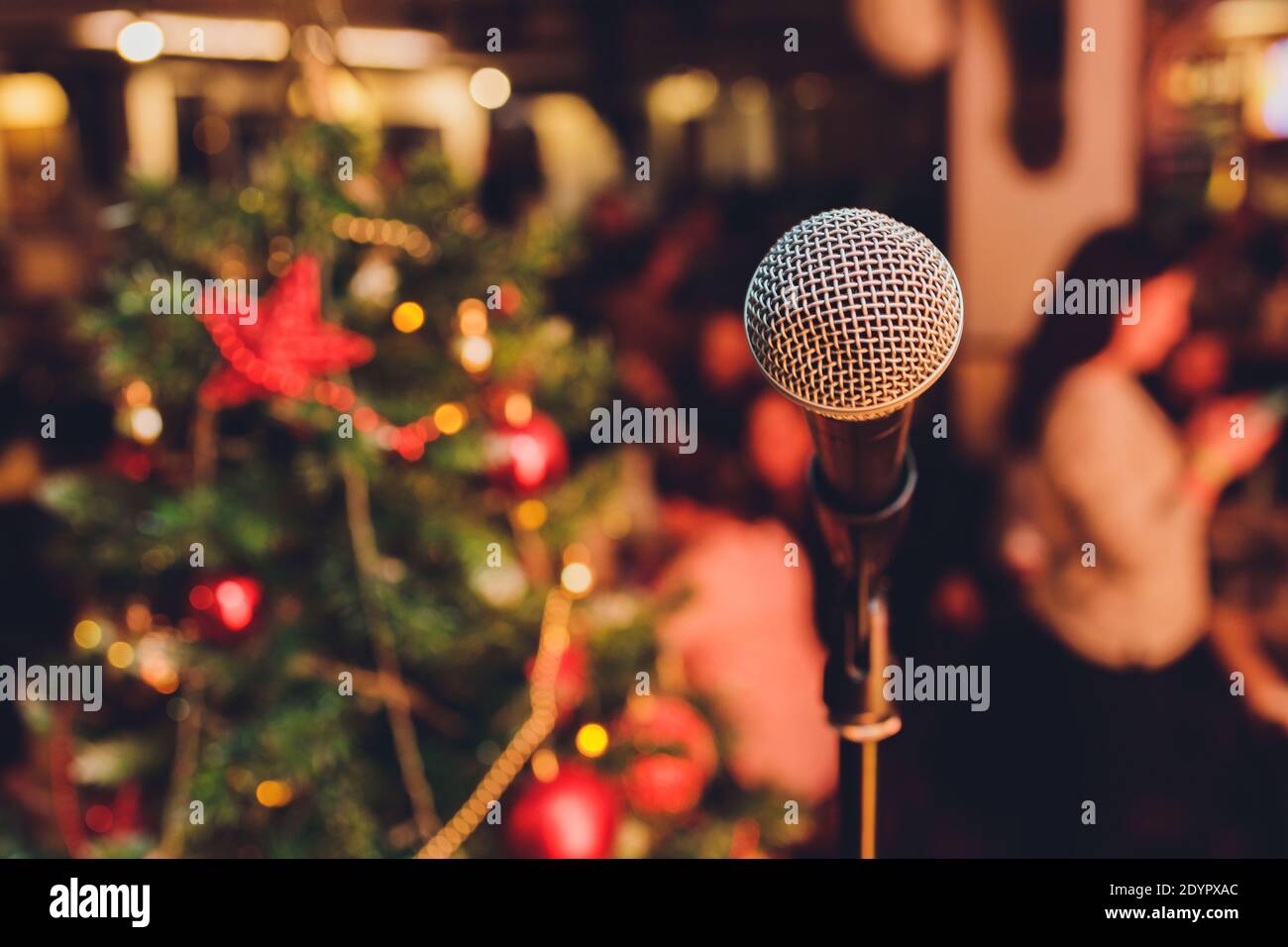 Retro microphone on stage in a pub or American Bar restaurant during a ...