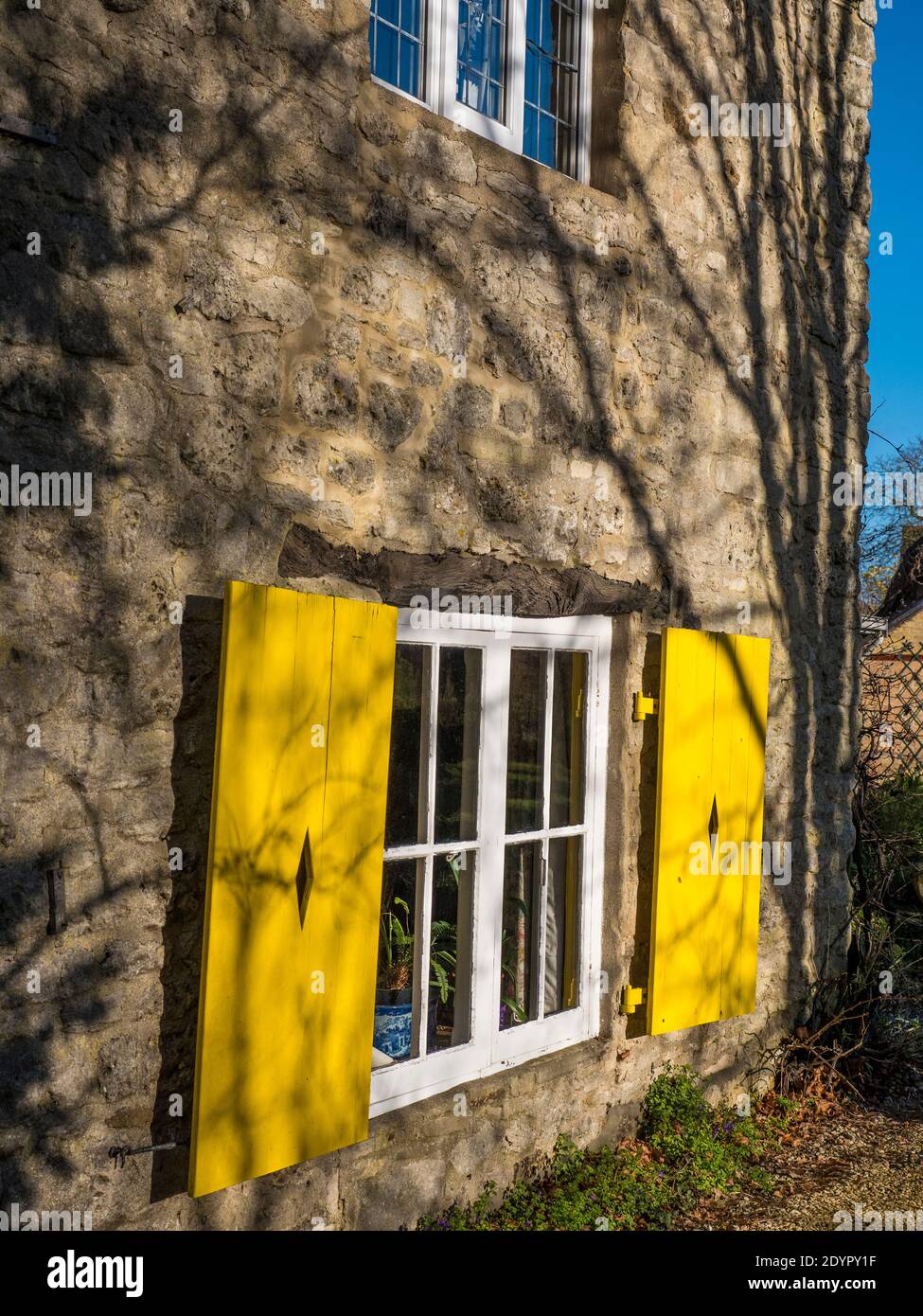 Yellow winder shutters hi-res stock photography and images - Alamy