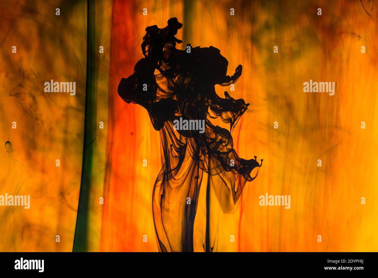Acrylic colors and ink in water. Abstract background Stock Photo - Alamy