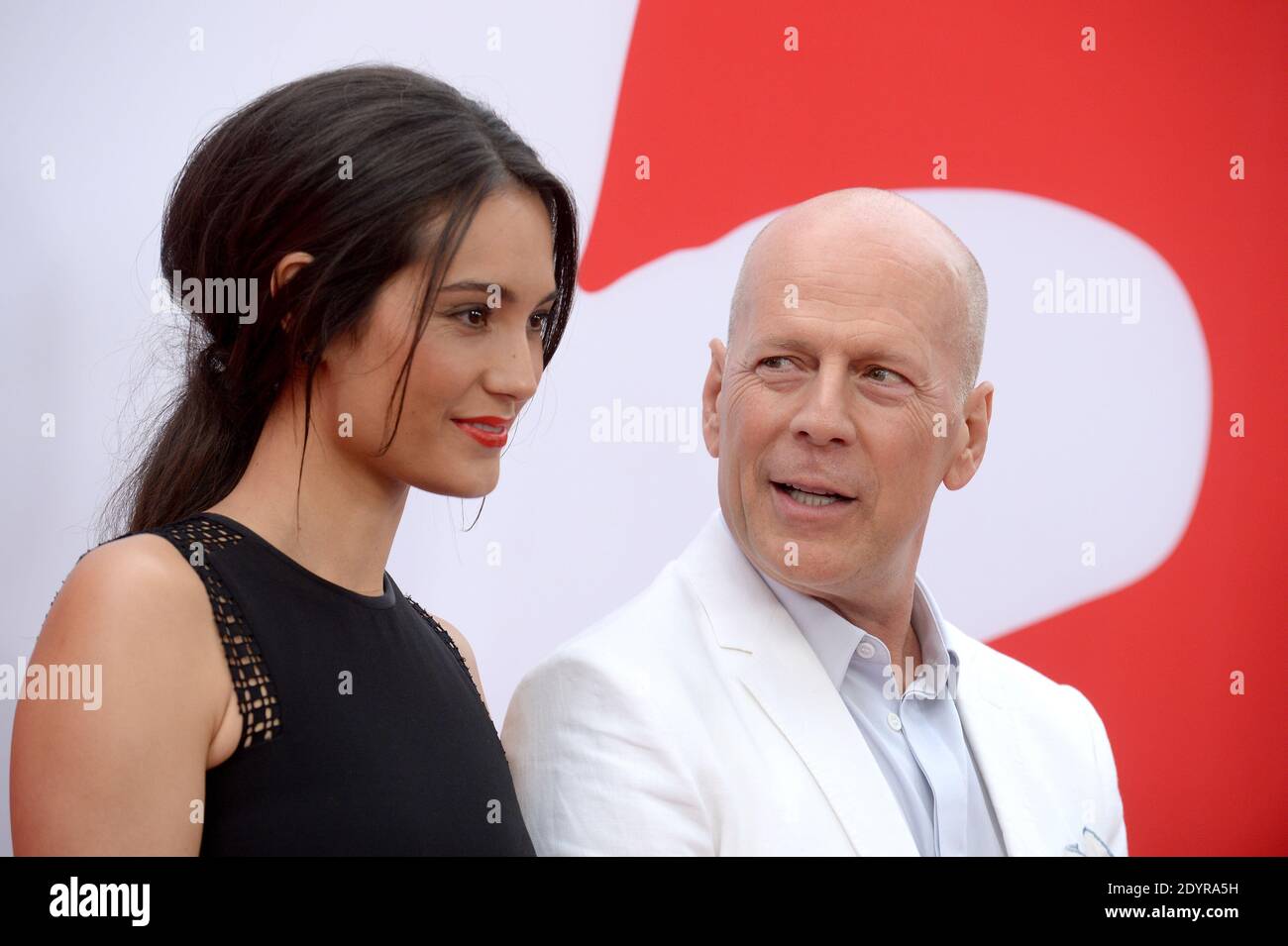 Bruce Willis and Emma Heming attend the premiere of RED 2 held at ...