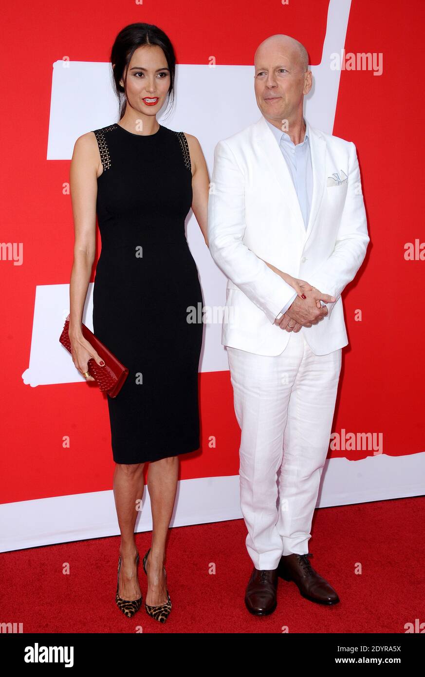 Bruce Willis and Emma Heming attend the premiere of RED 2 held at ...
