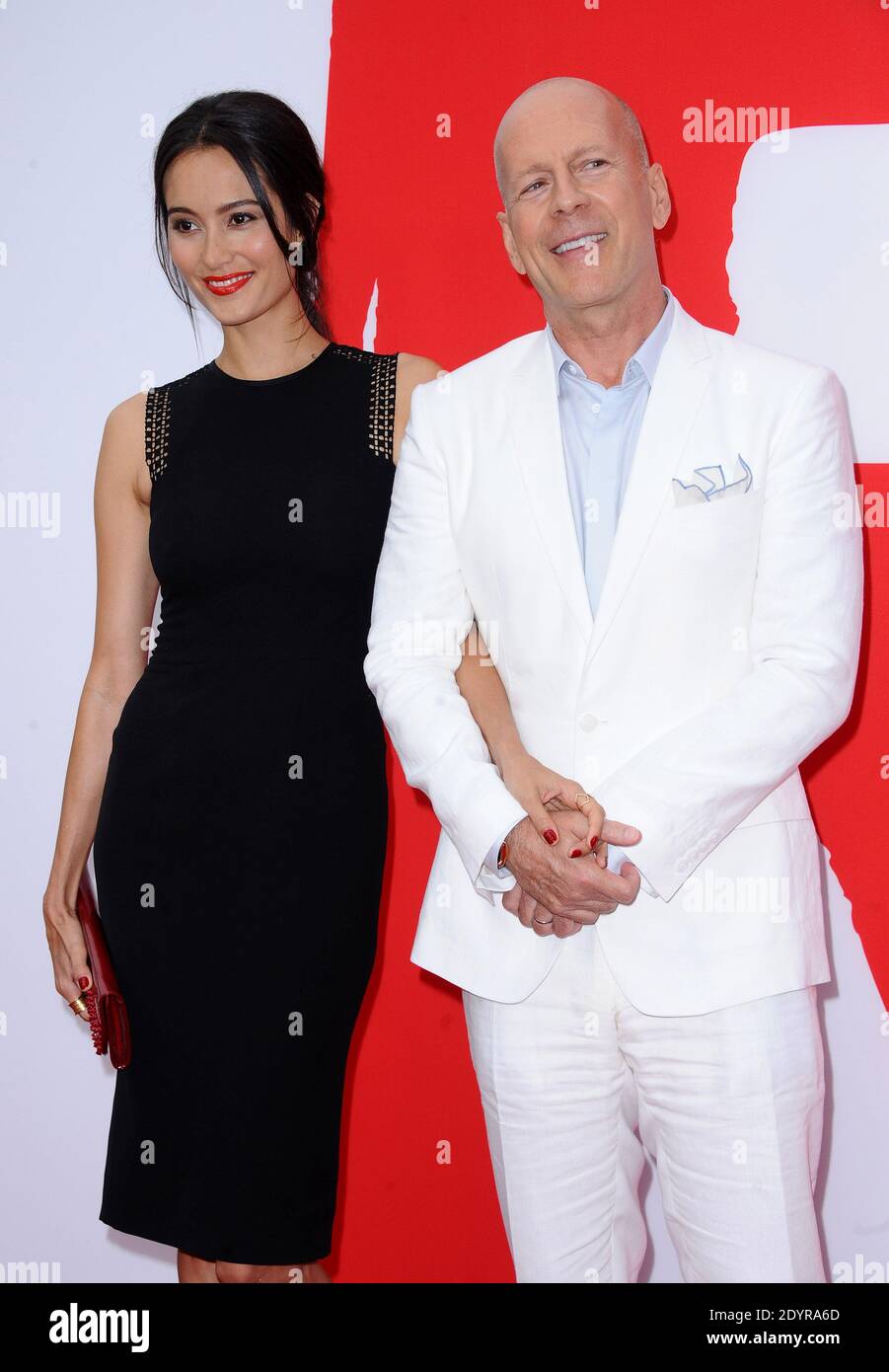 Bruce Willis and Emma Heming attend the premiere of RED 2 held at ...