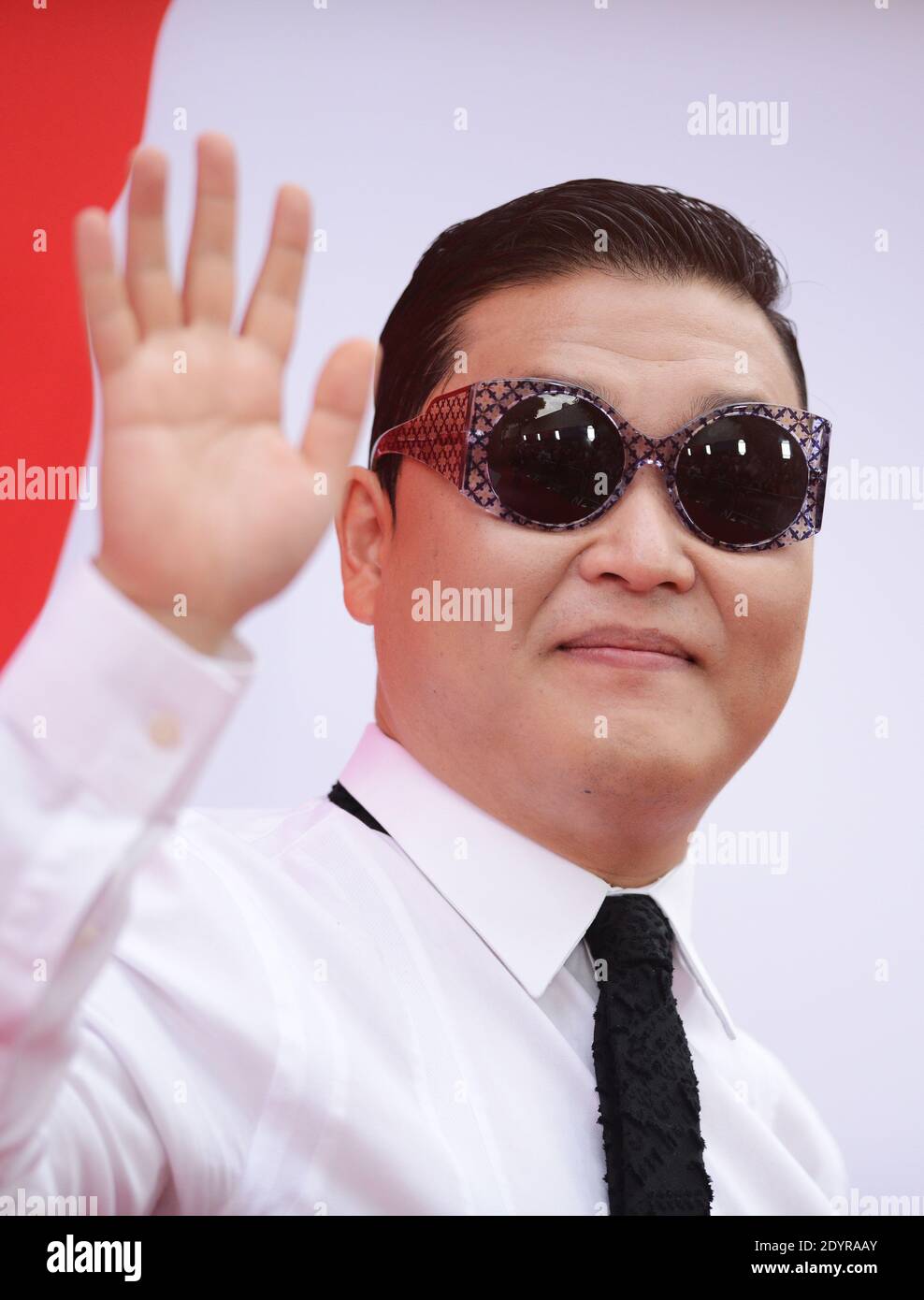 Psy attends the premiere of RED 2 held at Westwood Village Theatre in ...